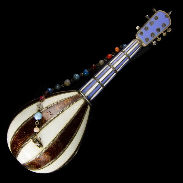 Buzuki-shaped musical instrument clock with an enamel decoration